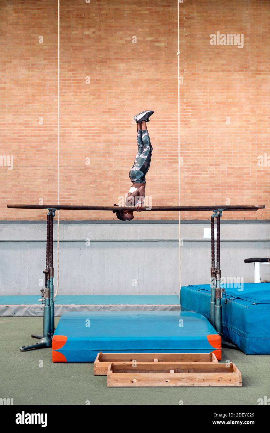 Stock Photo Of An African American Gymnastic Woman Practicing On