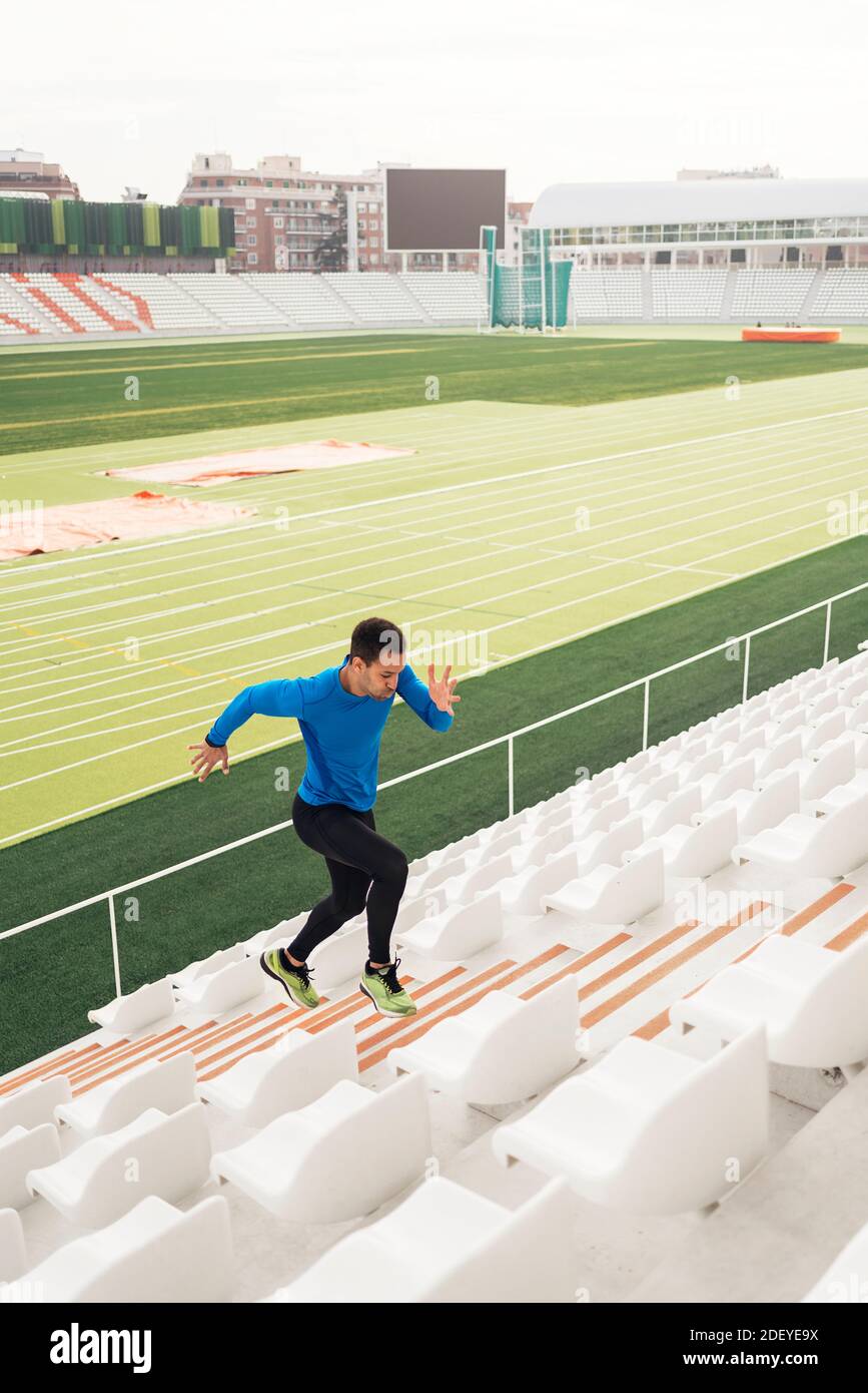 Stock photo of african american male athlete doing stadium stairs ...