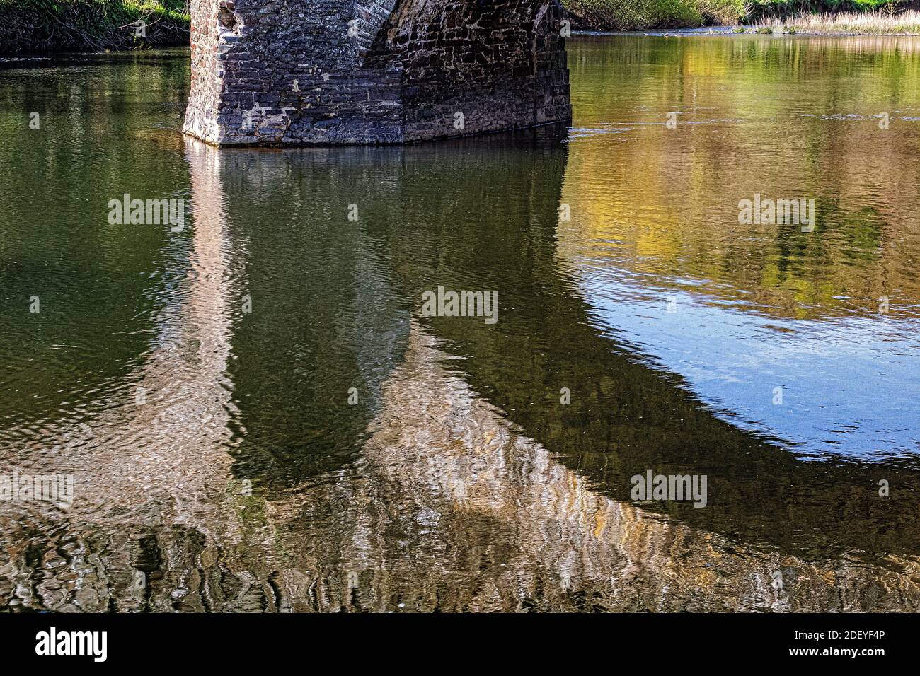 Colourful River Reflections Under the Arches of the Historic Taddiport ...