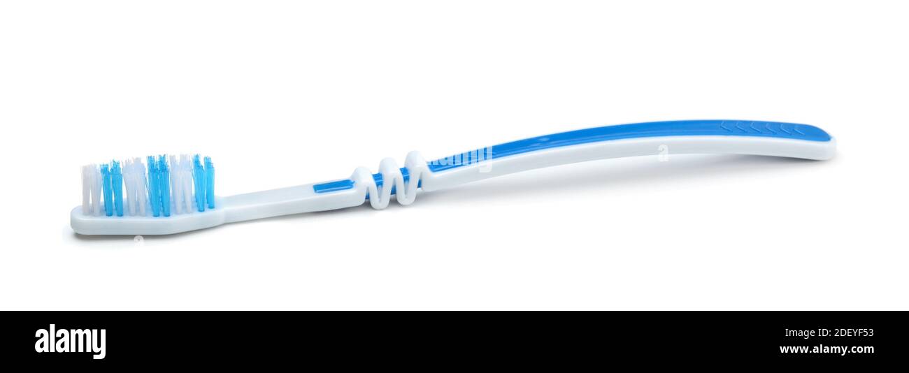 Plastic white toothbrush isolated on white Stock Photo - Alamy