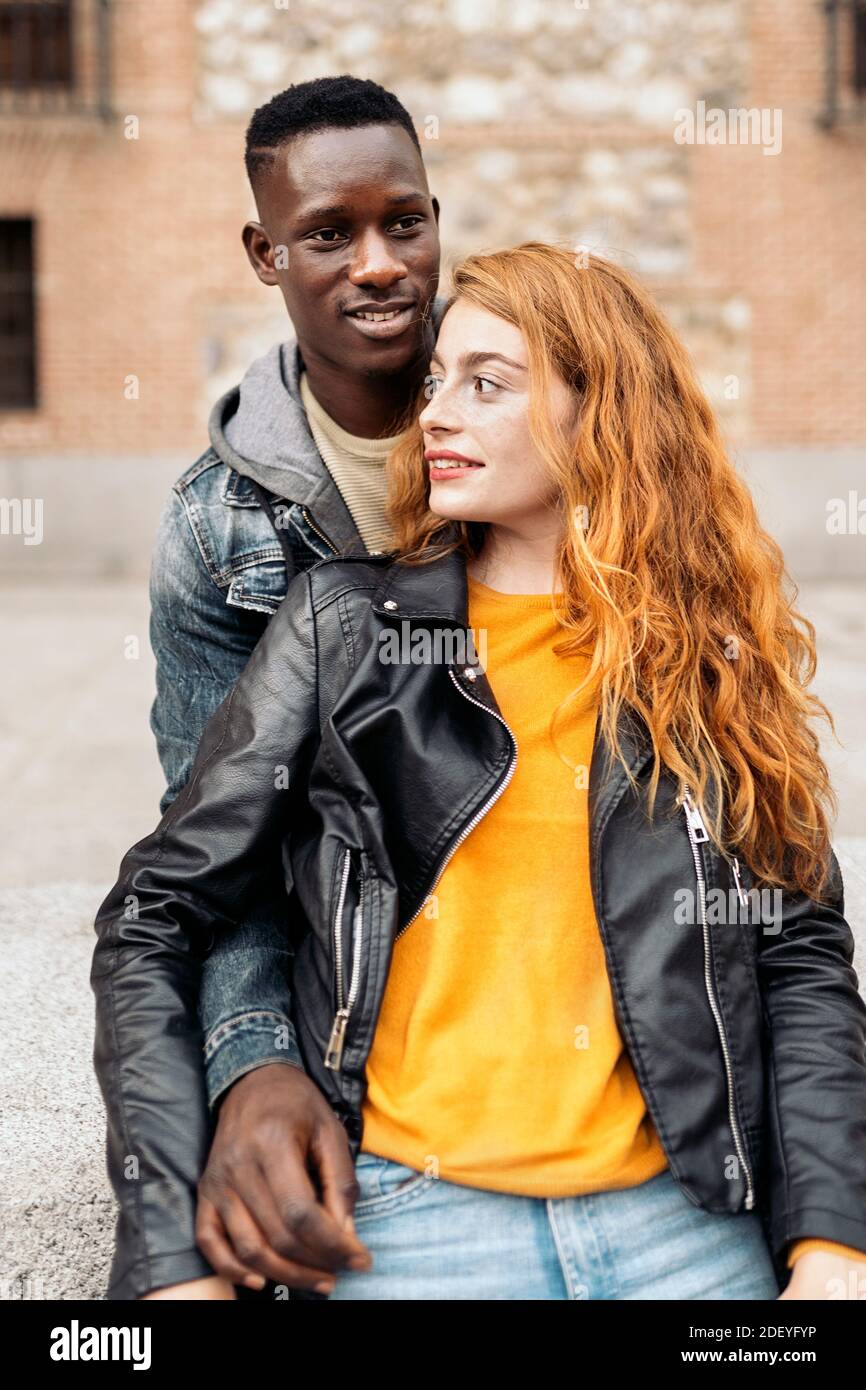 Multiethnic Young Couple Having Romantic Moments Together In The Street