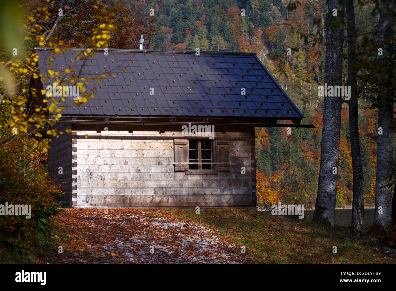 landscape with beautiful wooden house at the mountain. Autumn Stock ...