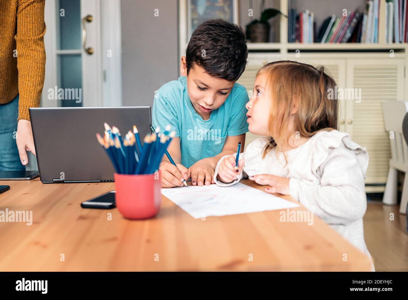 Stock photo of cute brother and his sister having fun in the living ...
