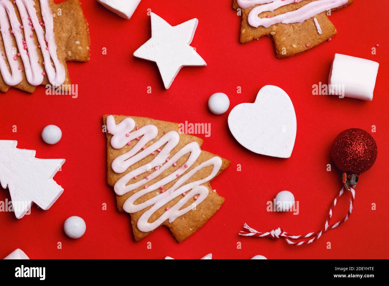 christmas gingerbread on a red background. Christmas Stock Photo - Alamy