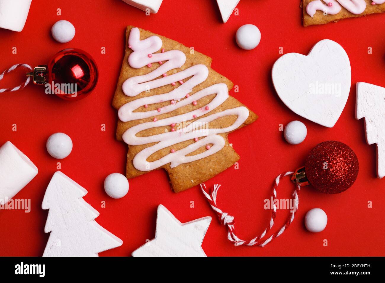 christmas gingerbread on a red background. Christmas Stock Photo - Alamy