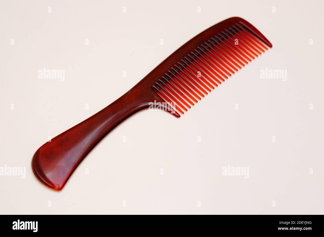 A shot of a new comb isolated on a white surface Stock Photo - Alamy