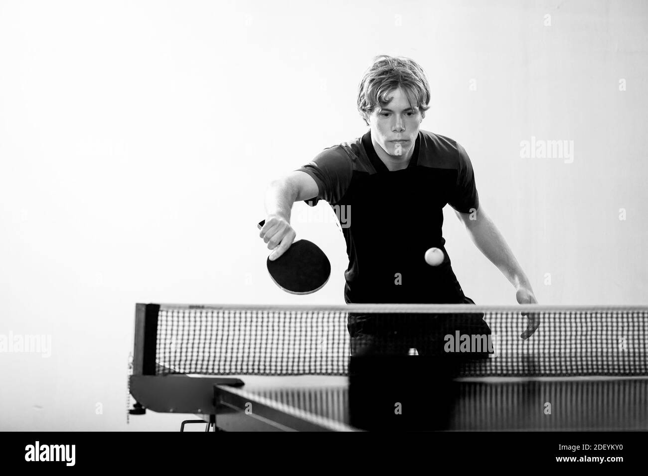 Teenager playing ping pong table tennis. Equipment, moving Stock Photo ...