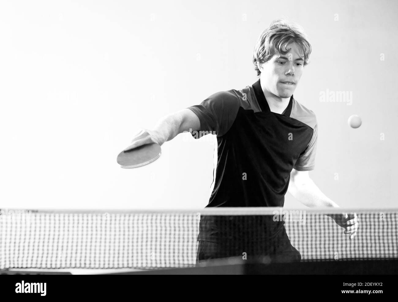 Teenager playing ping pong table tennis. Equipment, moving Stock Photo ...