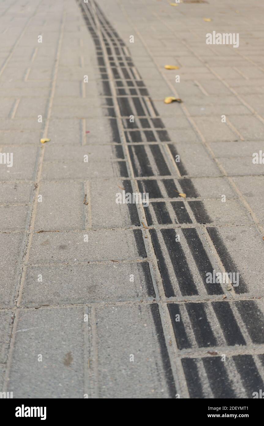A vertical shot of the track of a tire Stock Photo - Alamy