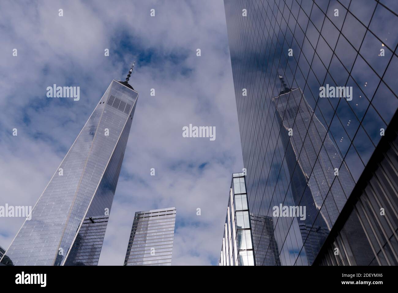 The One World Center building is seen reflected on other skycraper ...