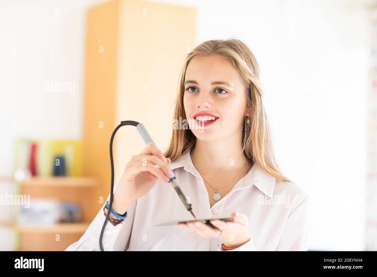 young student learning a technical method Stock Photo - Alamy