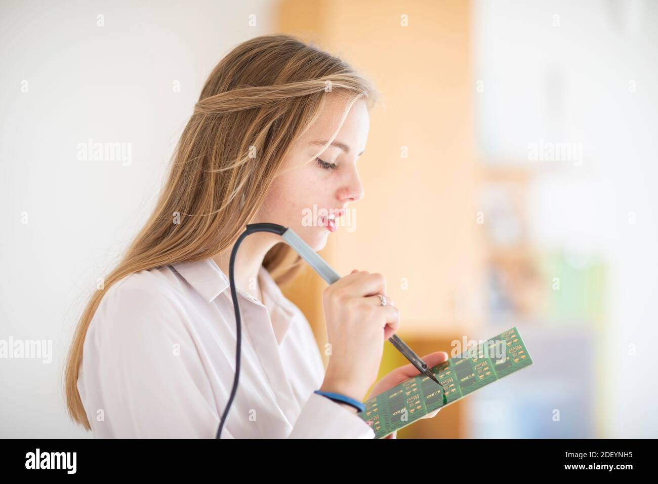 young student learning a technical method Stock Photo - Alamy