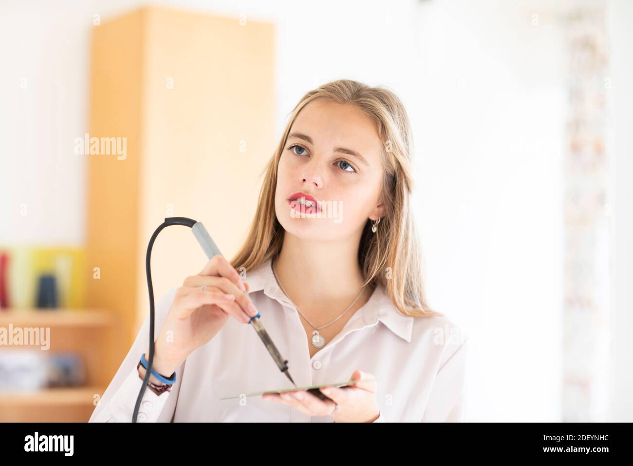 young student learning a technical method Stock Photo - Alamy