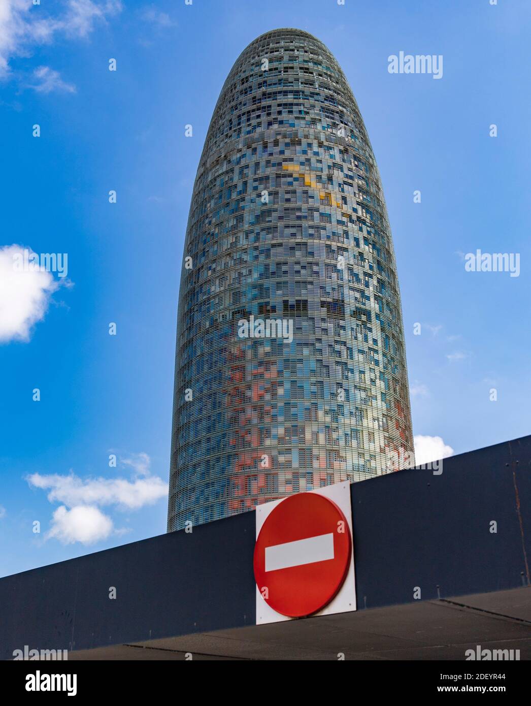 Beautifully colored building behind traffic signs Stock Photo - Alamy