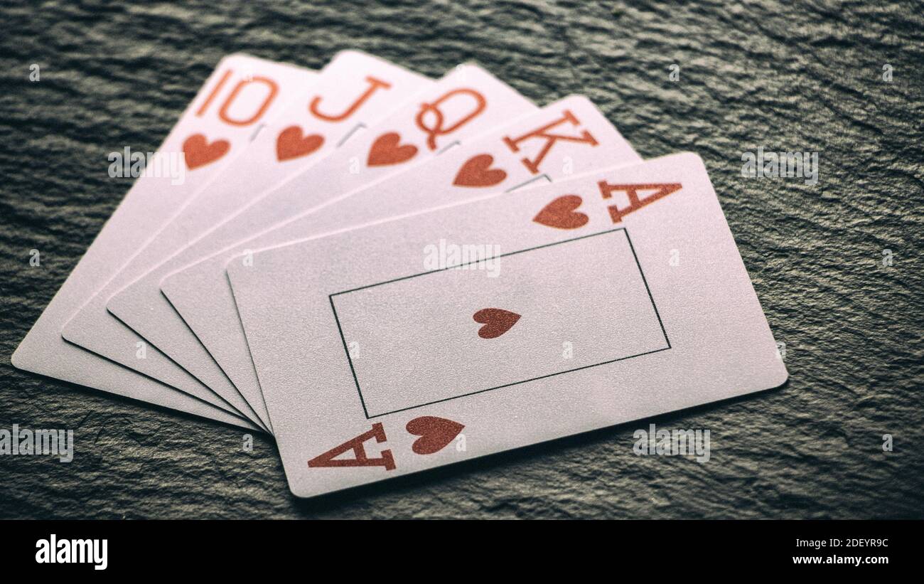 Royal Flush on a black background, a very rare poker hand Stock Photo ...