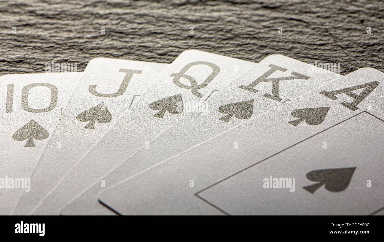 Royal Flush on a black background, a very rare poker hand Stock Photo ...