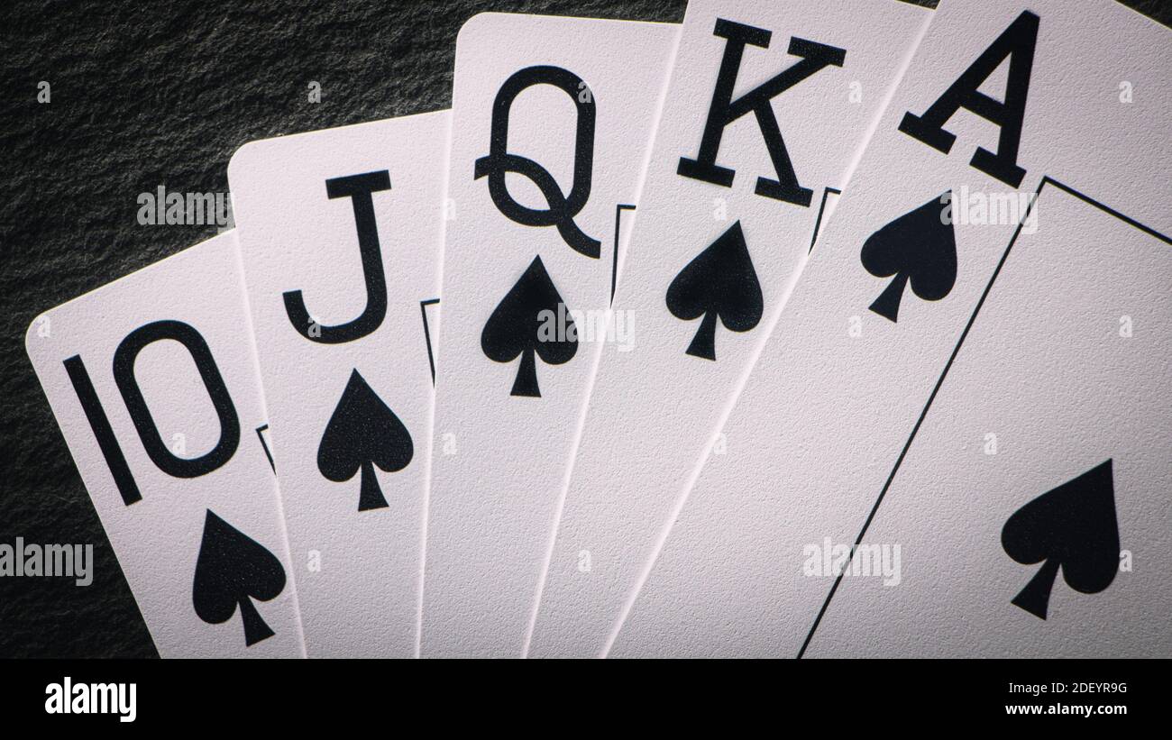 Royal Flush on a black background, a very rare poker hand Stock Photo ...