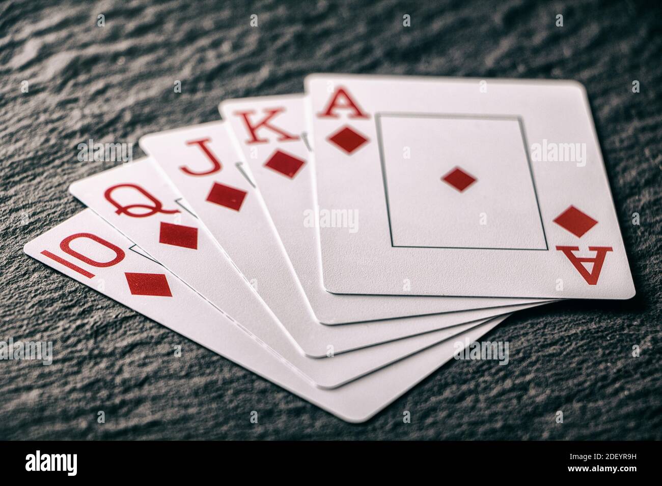 Royal Flush on a black background, a very rare poker hand Stock Photo ...