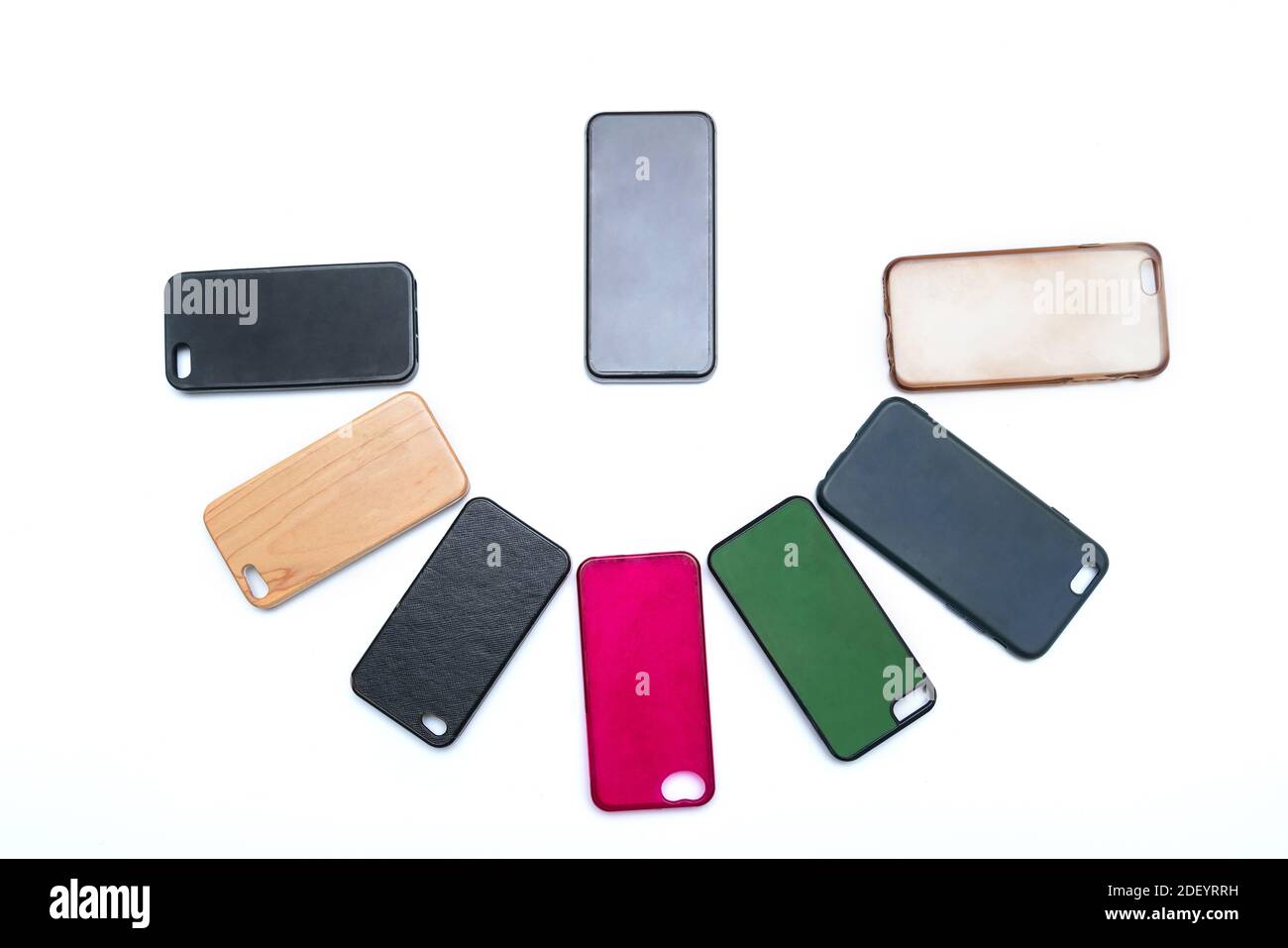 Pile of multicolored plastic back covers for mobile phone on white ...