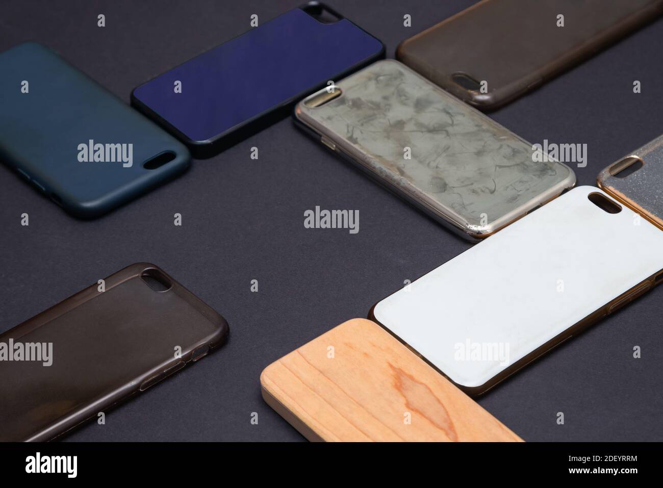 Pile of multicolored plastic back covers for mobile phone. Choice of ...