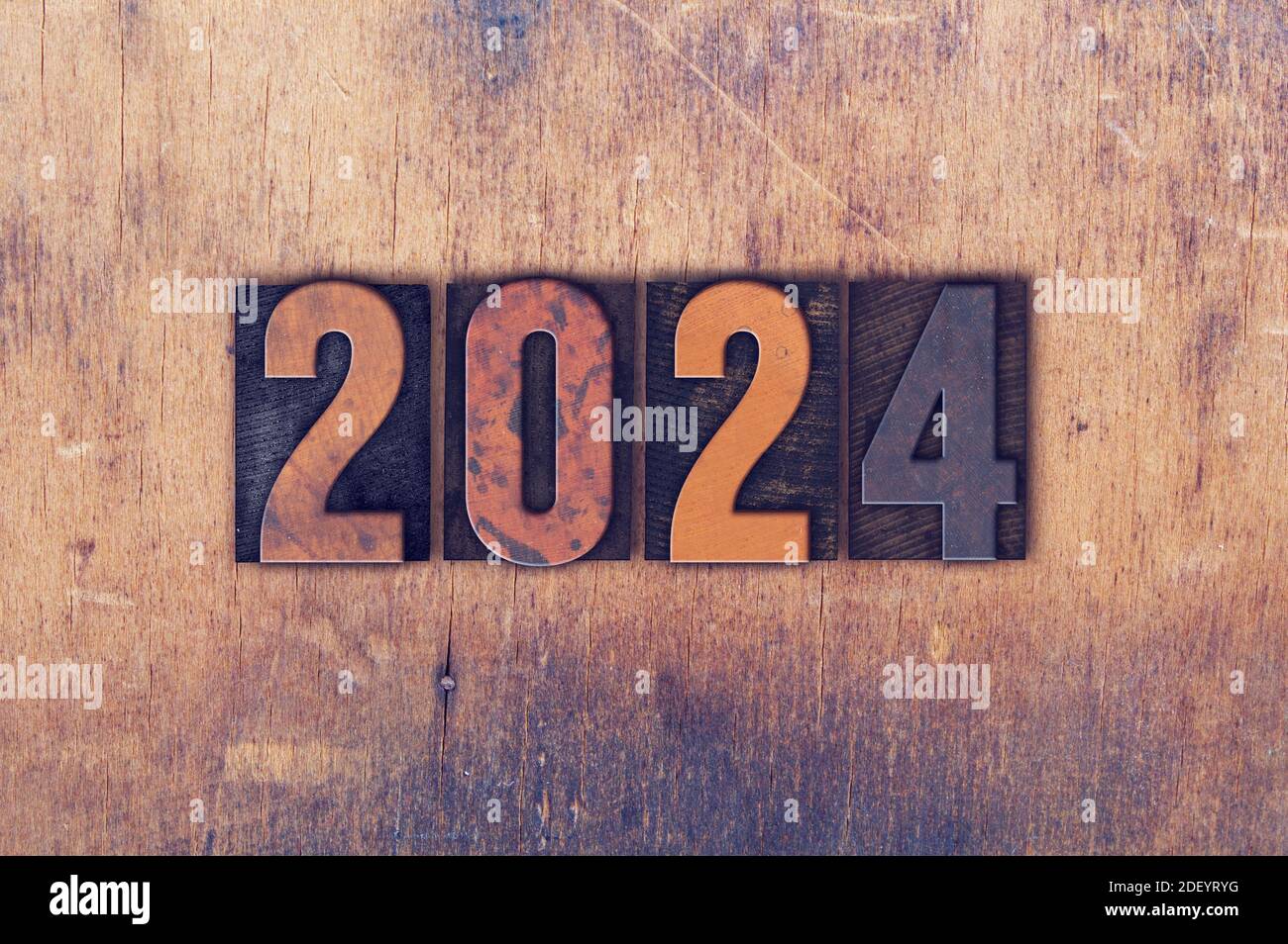 The year 2024 written in old vintage letterpress type Stock Photo - Alamy