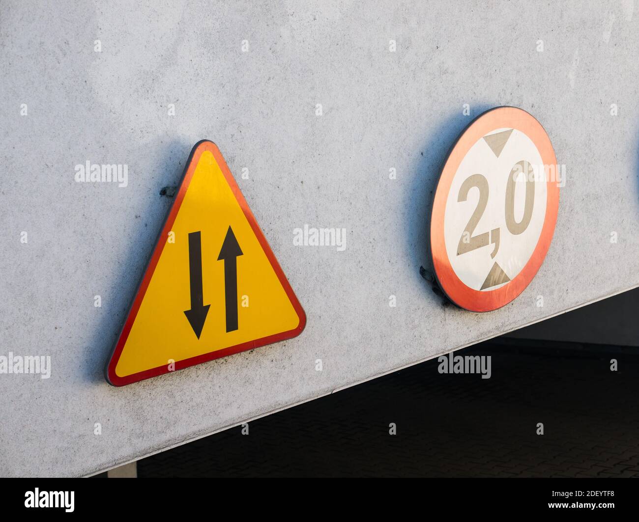 A closeup shot of warning signs on a garage entrance Stock Photo - Alamy