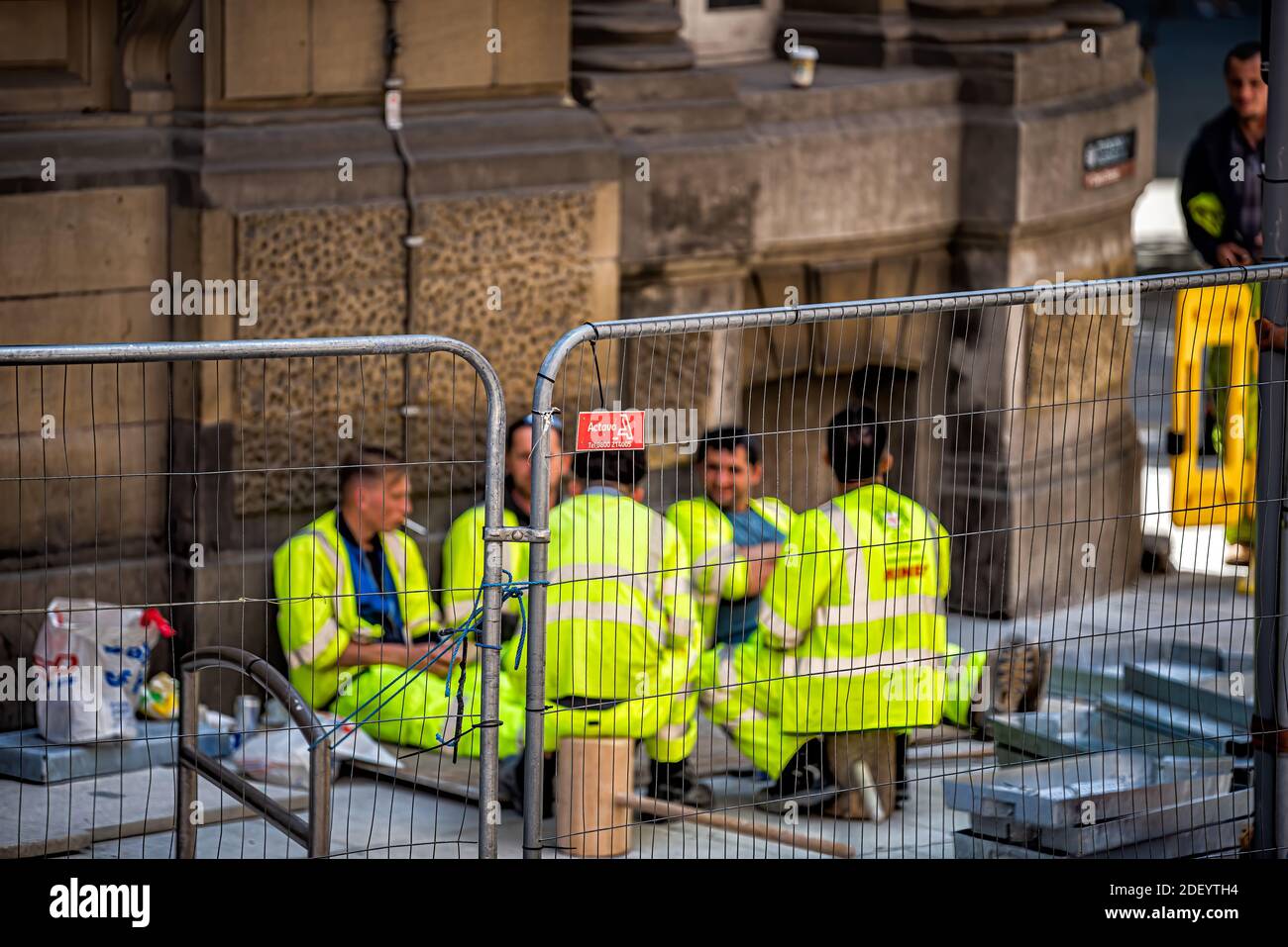 London, UK - June 22, 2018: Street road with people workers eating ...