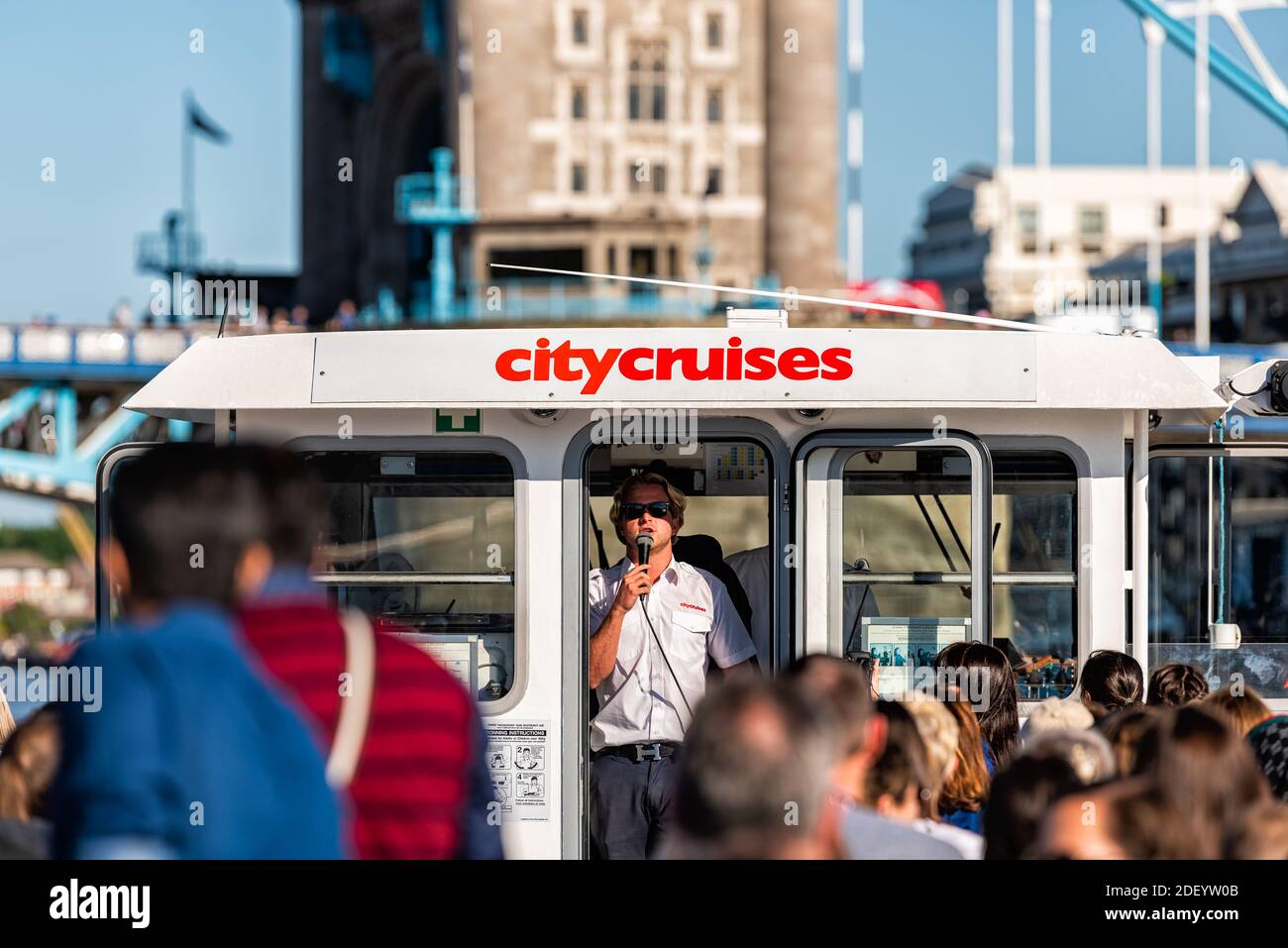 Tour guide speaking on microphone hi-res stock photography and images ...