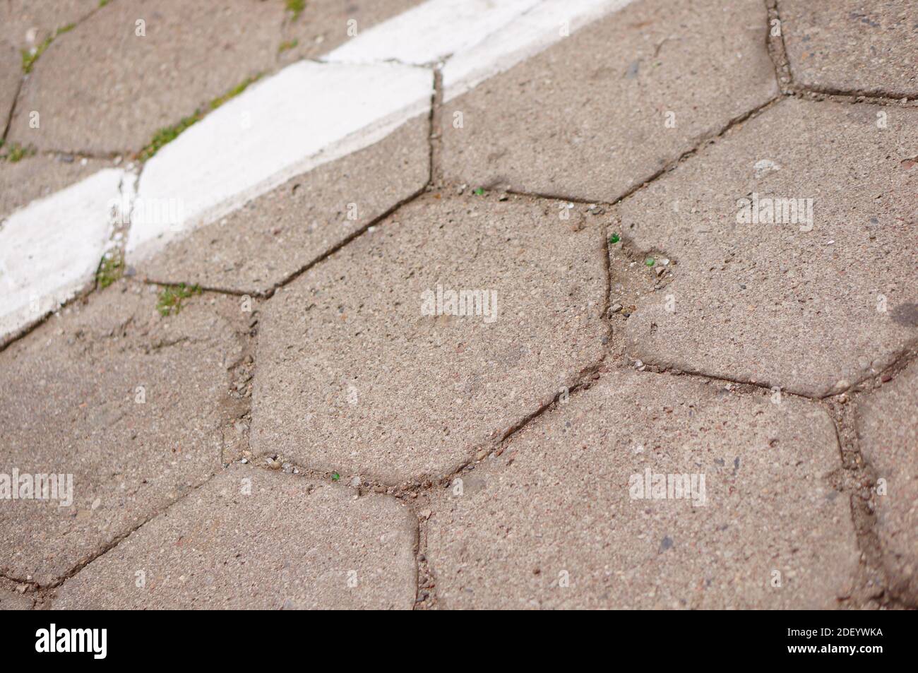 A top view closeup of an old pavement with hexagon patterns Stock Photo ...