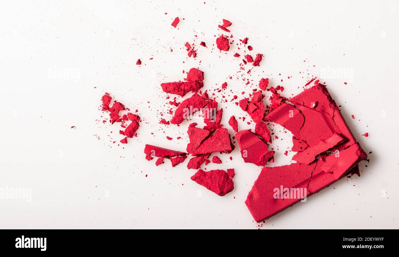 Red cosmetic powder on a white background, material for makeup Stock ...