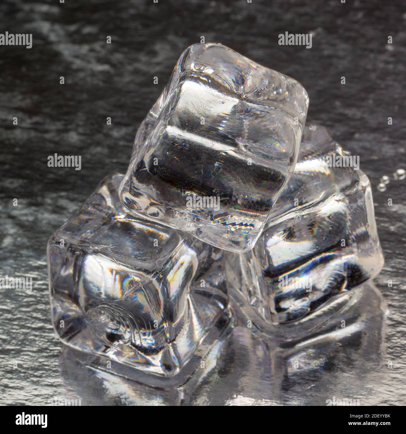 Pyramid of melted ice cubes with drops Stock Photo - Alamy