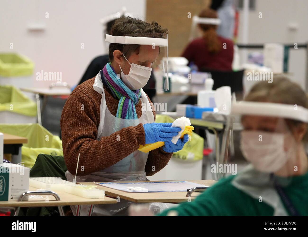 People clean equipment in between an asymptomatic test using lateral ...