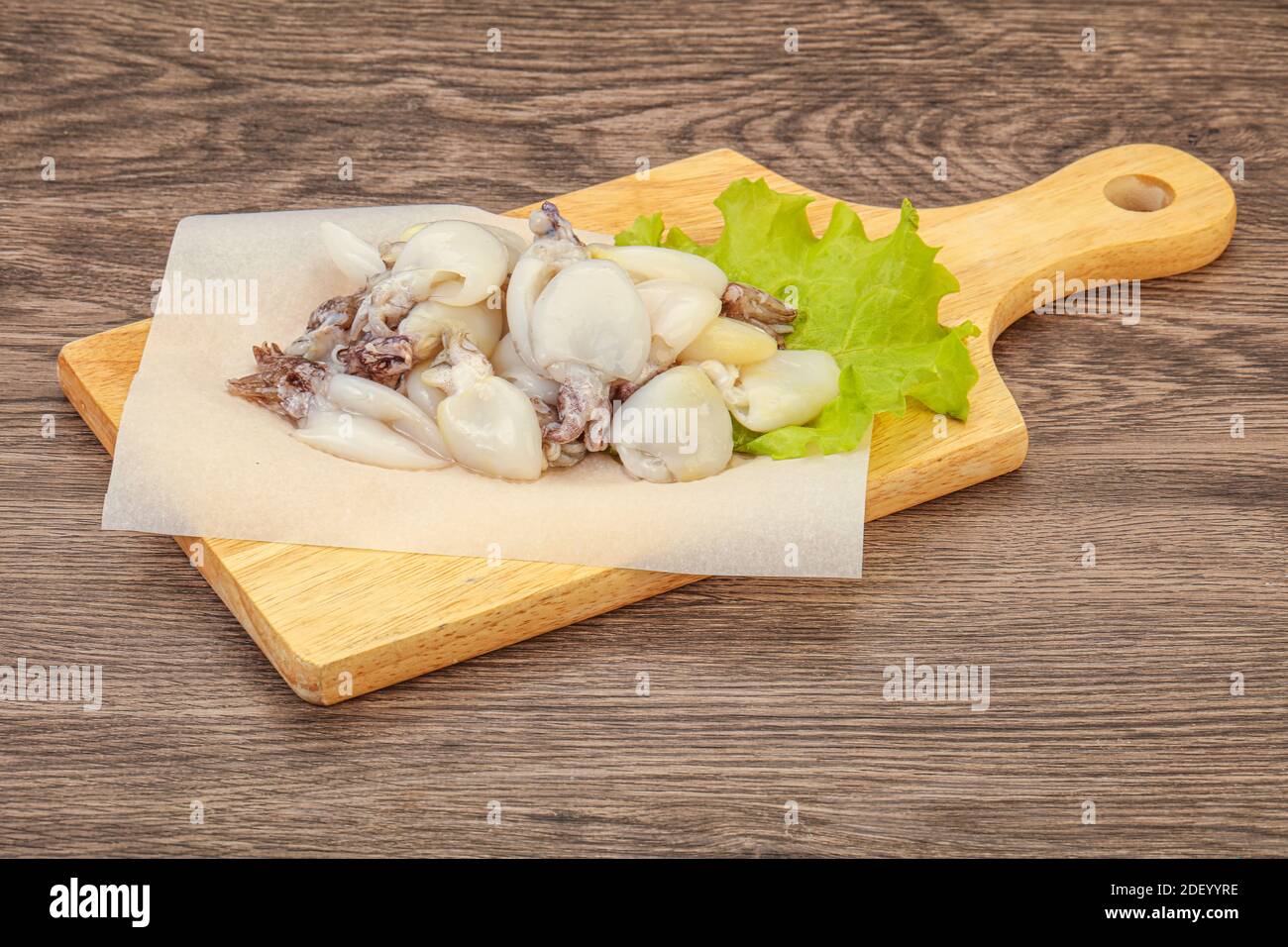 Raw seafood - cuttlefish for cooking over board Stock Photo - Alamy