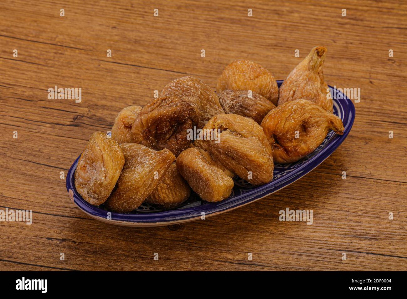 Dry sweet fig fruit heap snack Stock Photo - Alamy