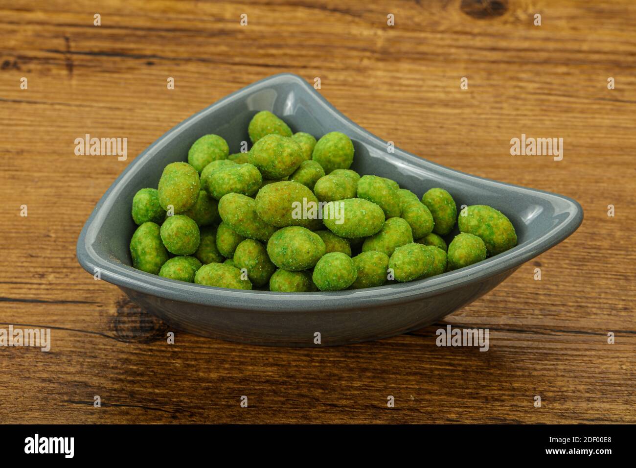 Spicy wasabi peanuts snack in the bowl Stock Photo - Alamy