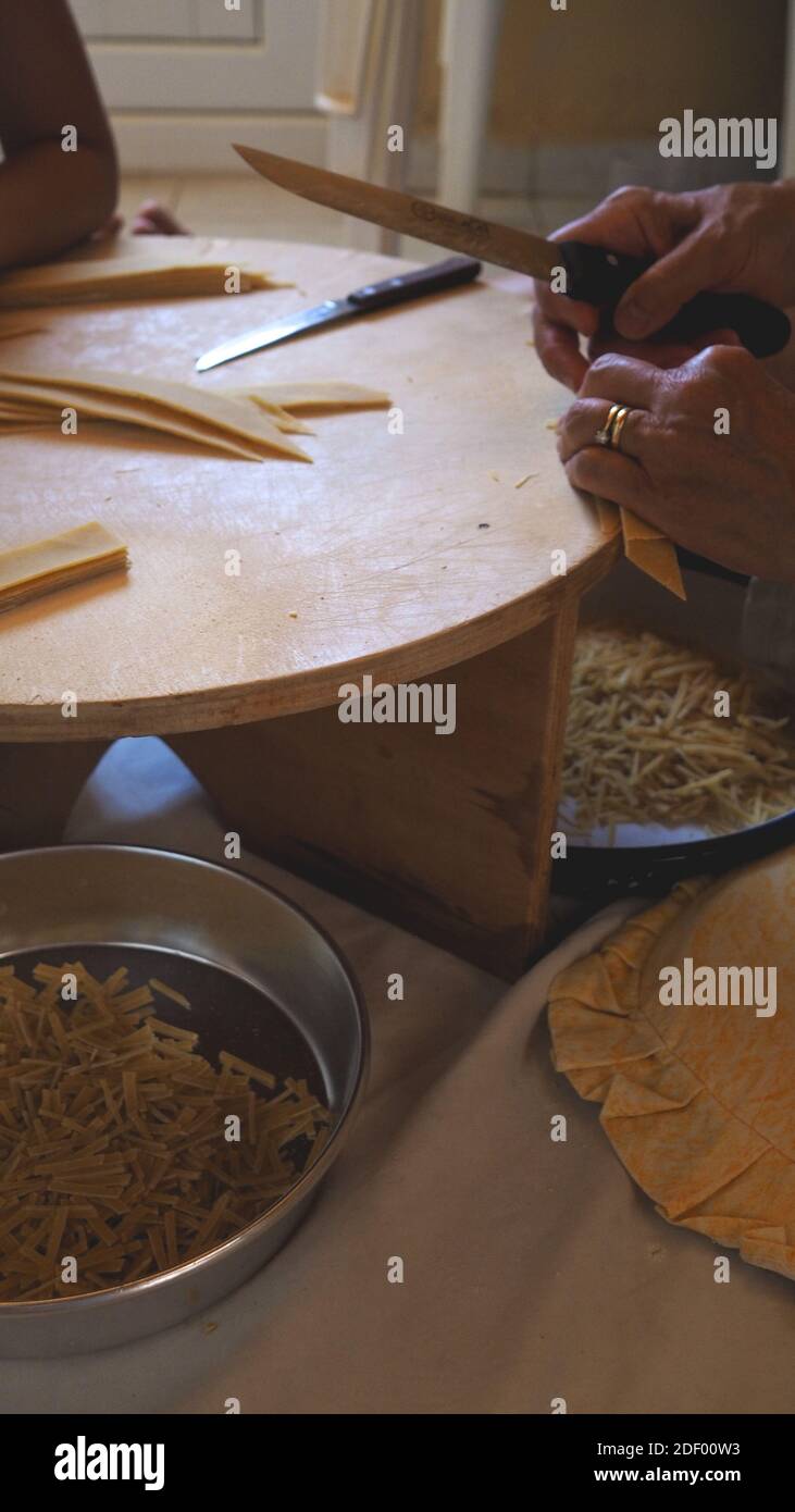 A vertical shot of pasta making process Stock Photo - Alamy