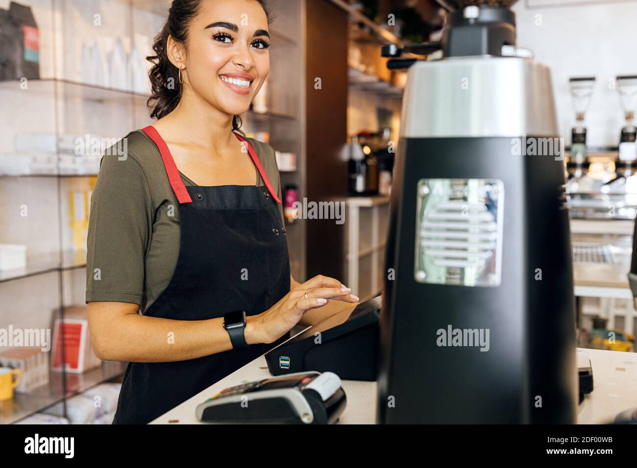 Beautiful young barista standing in hi-res stock photography and images ...