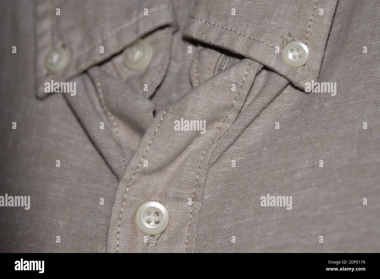Unbutton hi-res stock photography and images - Alamy