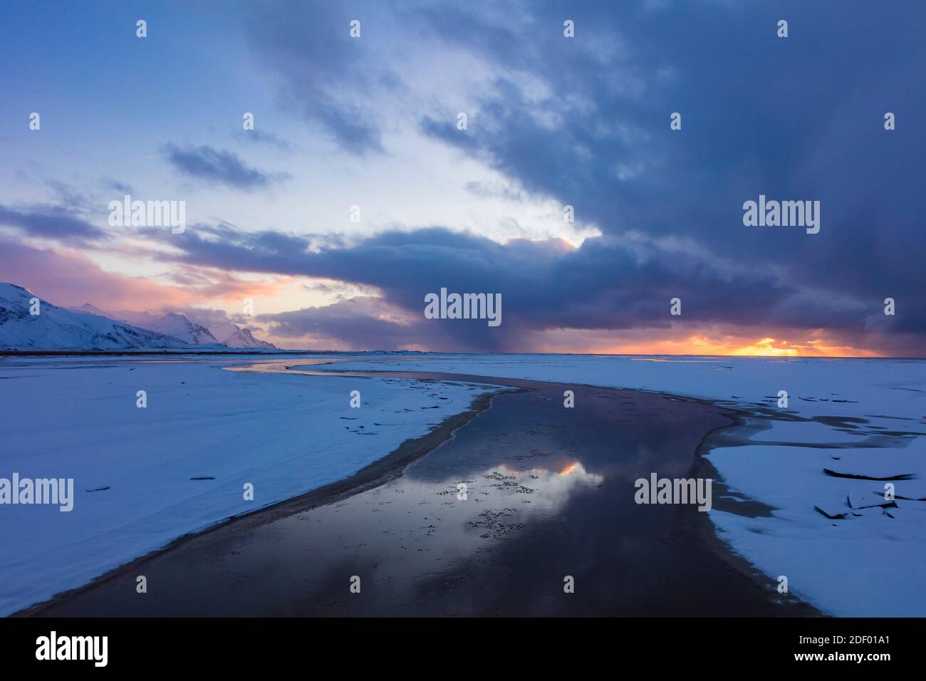 Iceland River leading into the distant sunset Stock Photo - Alamy