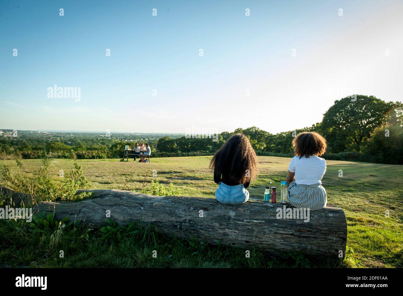 People enjoying evening sun at Harrow View Point Stock Photo - Alamy
