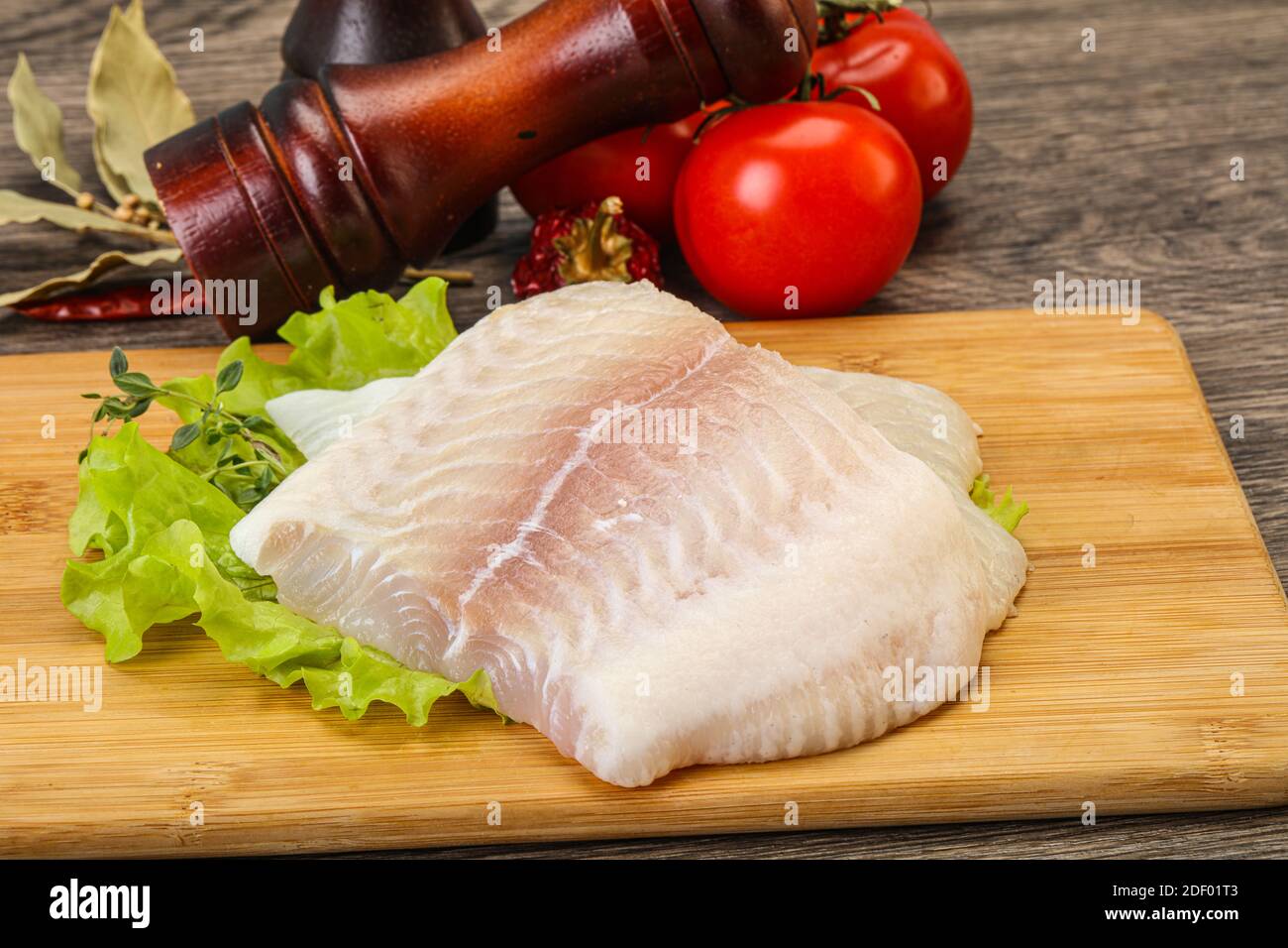 Raw pangasius fillet fish for cooking Stock Photo - Alamy