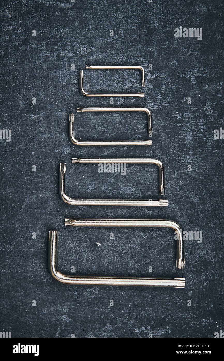 Pyramid of a set of star end keys on a gray background, top view Stock ...