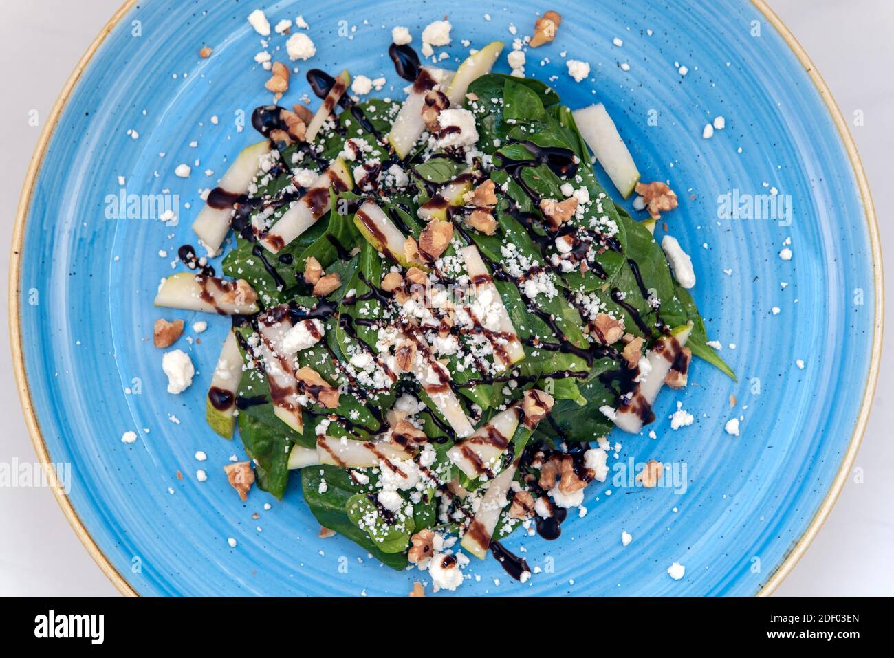 Overhead view of authentic Italian food shows nutritious salad stacked ...
