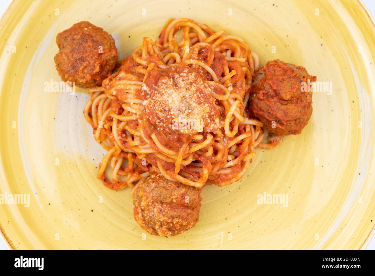 Overhead view of authentic Italian food shows kids sized plate of ...