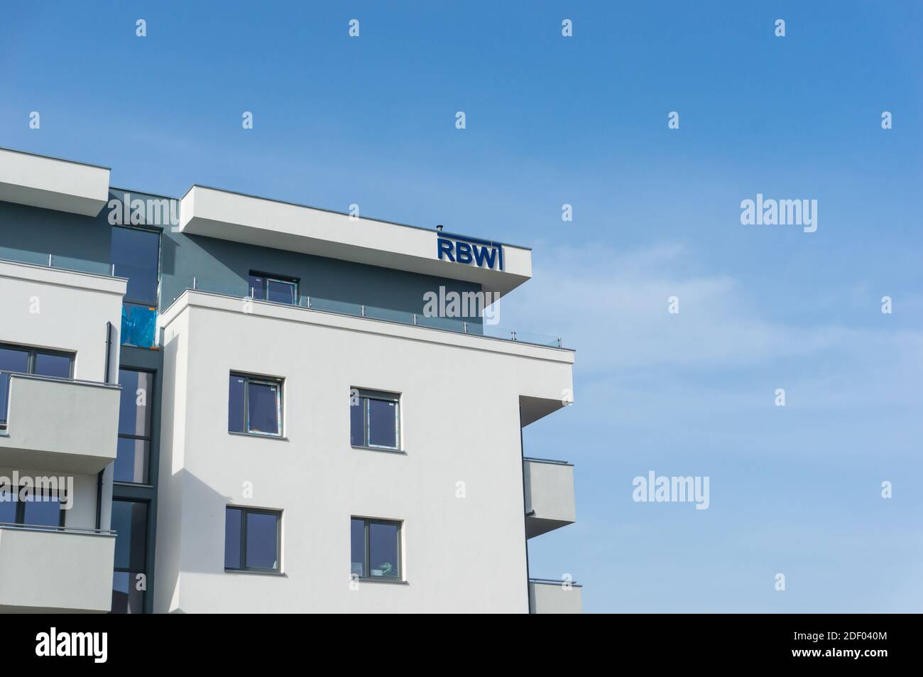 POZNAN, POLAND - Apr 03, 2016: Top of a new modern apartment building ...