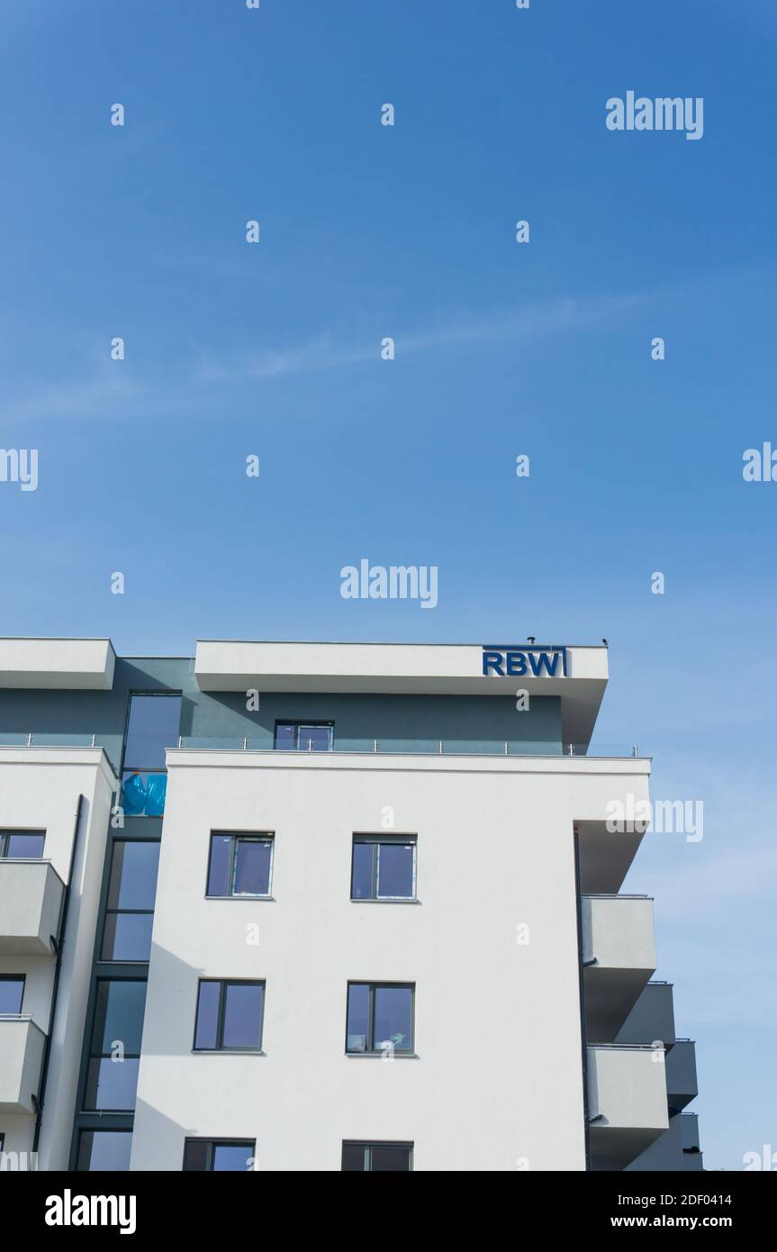 POZNAN, POLAND - Apr 03, 2016: Top of a new modern apartment building ...