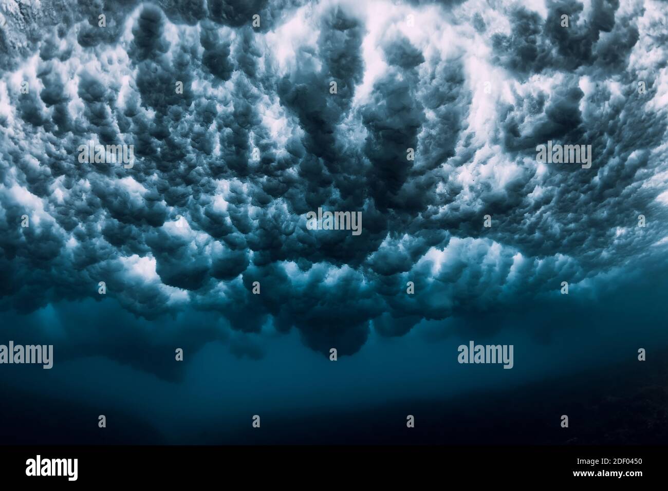 Underwater ocean wave with foam and bubbles. Transparent water and ...