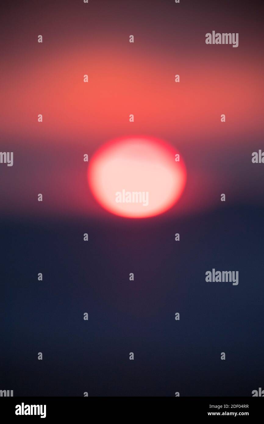 Out of focus view of the sunrise Stock Photo - Alamy