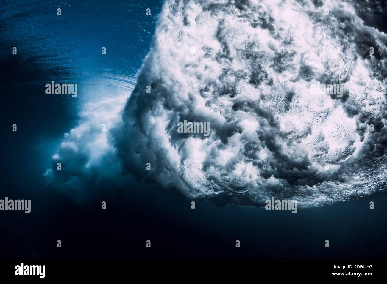 Breaking wave with foam and bubbles underwater. Transparent ocean water ...