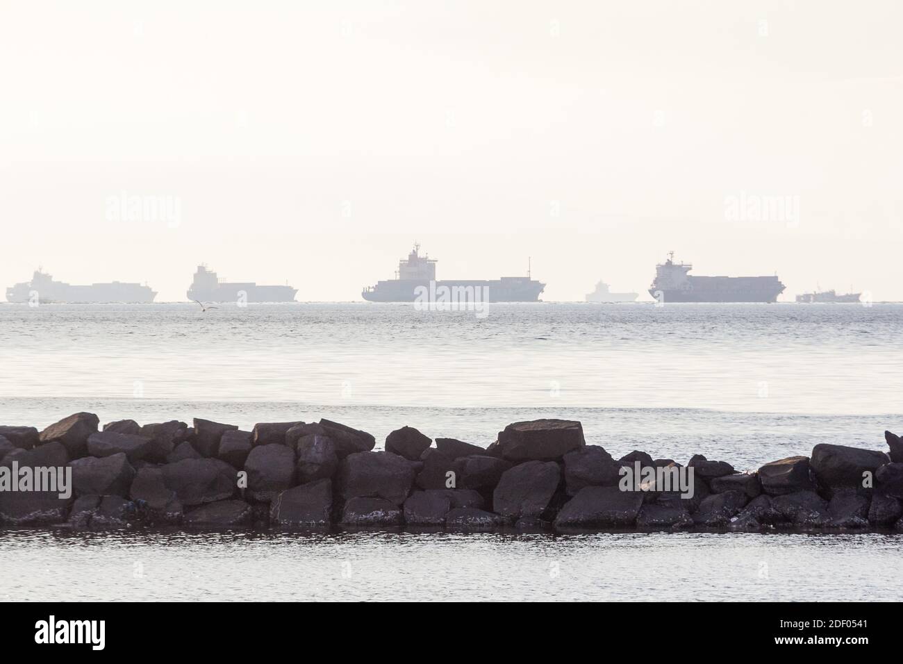 Cargo ships as seen in Manila Bay in the Philippines Stock Photo - Alamy